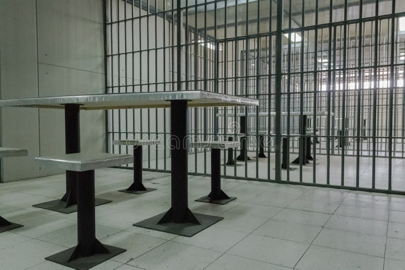Prison Cell with Gray Tones, and Metal Benches Stock Photo - Image of ...