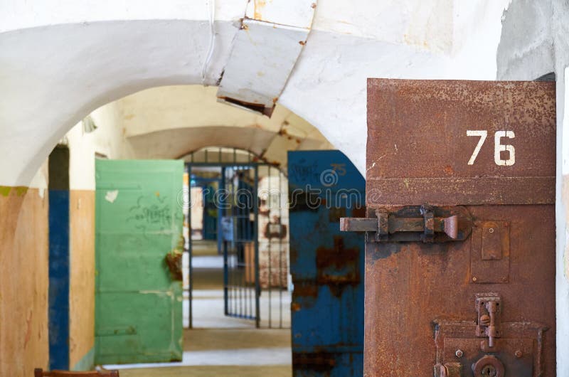 Prison Hall with Cell Doors Stock Photo - Image of barbed, horizontal ...