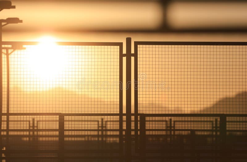Prison Mesh Fence Orange Sunset Stock Image - Image of metal, light ...
