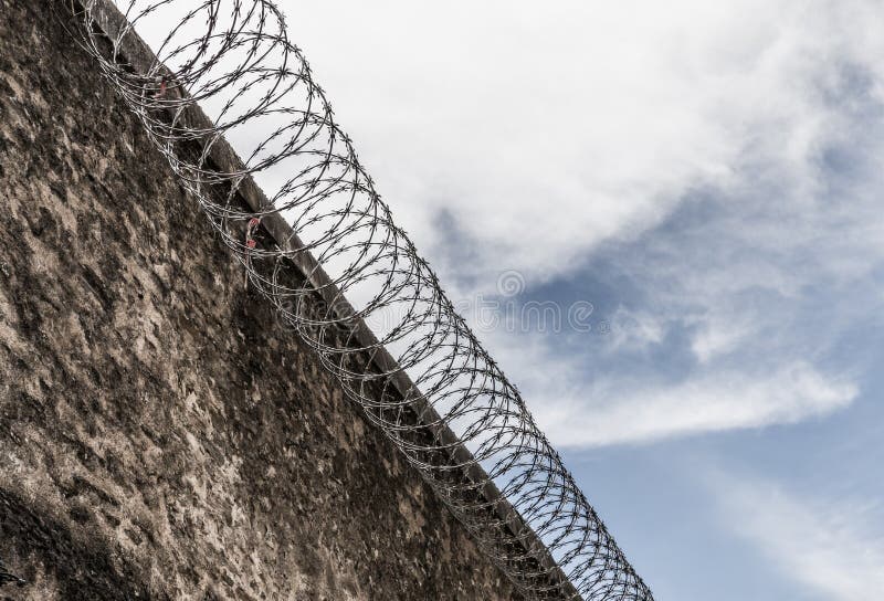 Prison Wall with Barbed Wire Stock Image - Image of stone, iron: 95837857