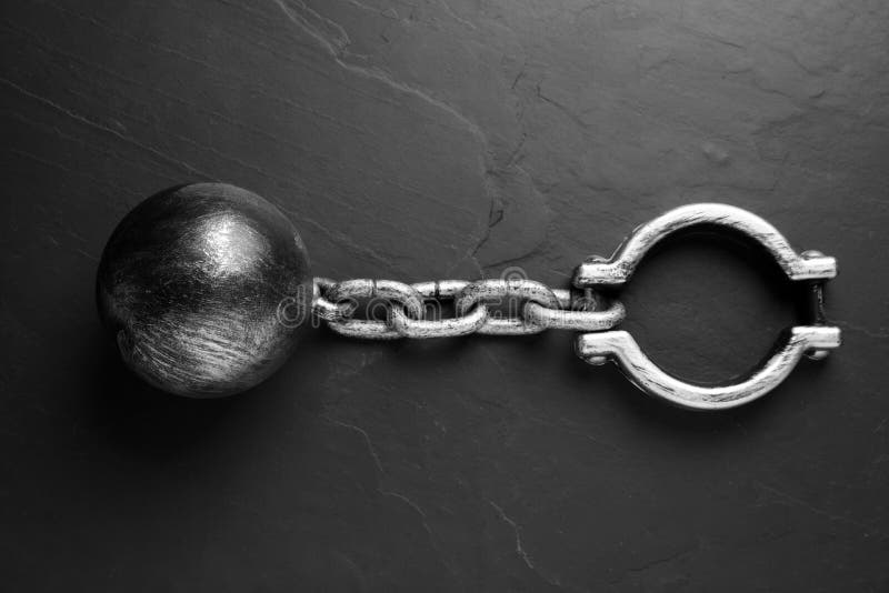 Prisoner Ball with Chain on Black Table, Top View Stock Image - Image ...