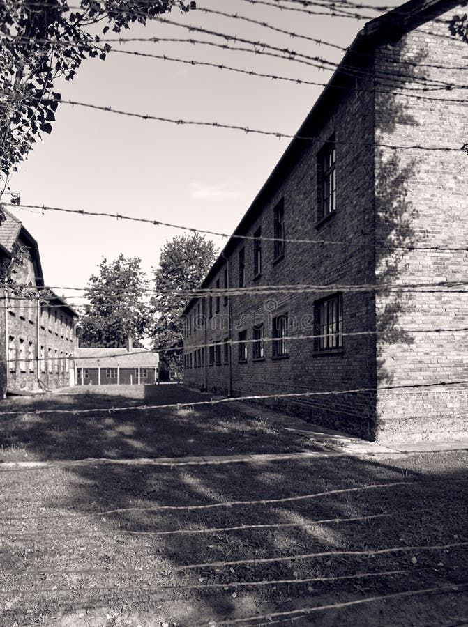 Prisoner Barracks in a Concentration Camp with a Barbed Fence in Front ...