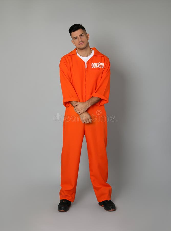 Prisoner in Orange Jumpsuit on Grey Background Stock Photo - Image of ...