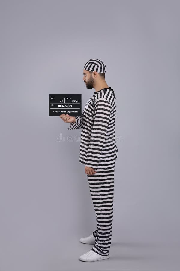 Prisoner with Mugshot Letter Board at Police Department Stock Photo ...