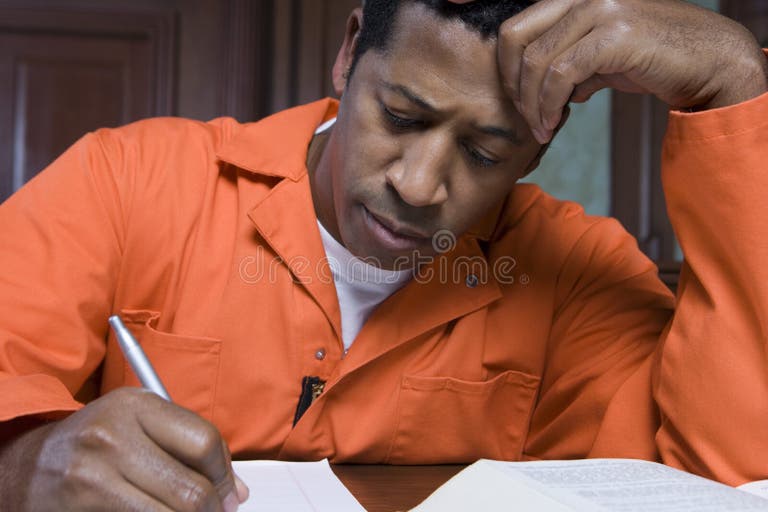 Prisoner Writing in Court stock image. Image of document - 29663029
