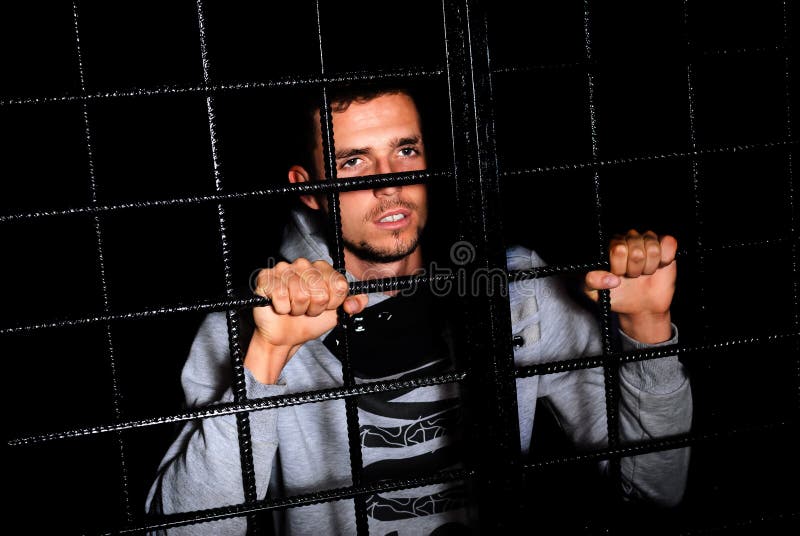 Happy Man in Prison Cell stock photo. Image of penitentiary - 13713904