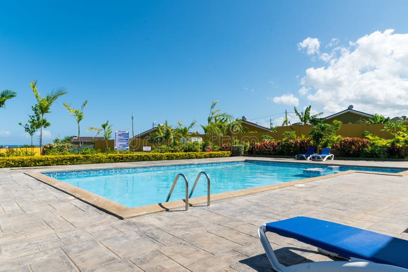 Pristine, Azure Swimming Pool Against the Blue Sky Stock Photo - Image ...