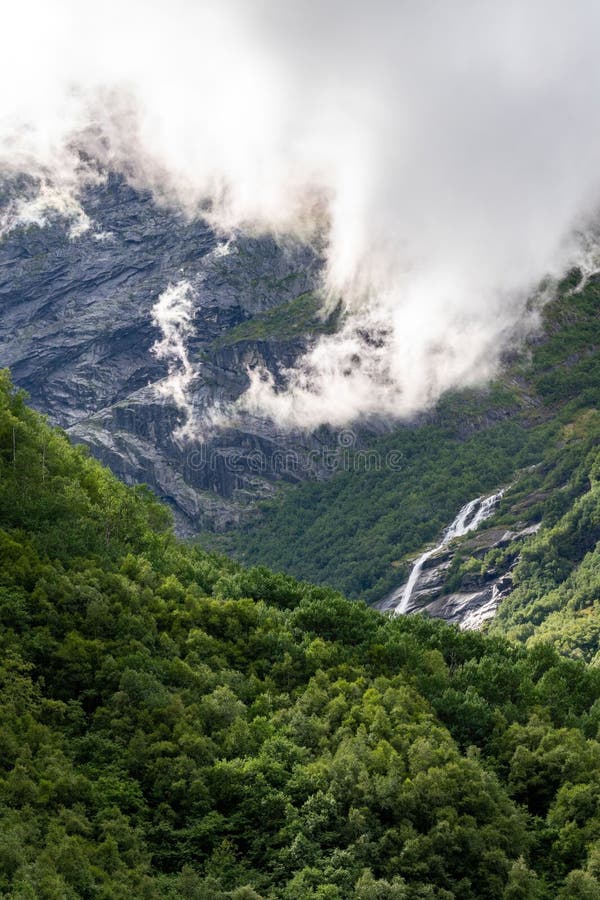 Pristine Stream Winds Its Way between Majestic Green Mountains Hidden ...