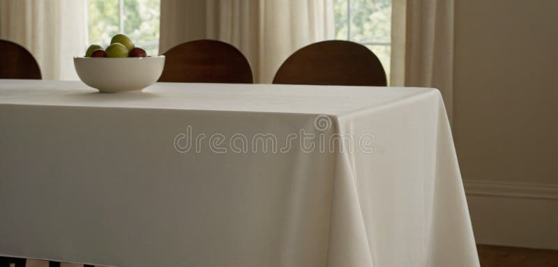A Pristine White Tablecloth Draped Gracefully Over a Sleek, Modern ...