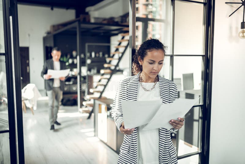 Busy Private Assistant of Businessman Reading Some Documents Stock ...