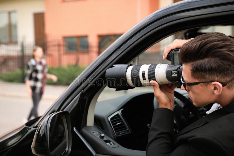 Private Detective with Camera Spying from Car Stock Image - Image of ...