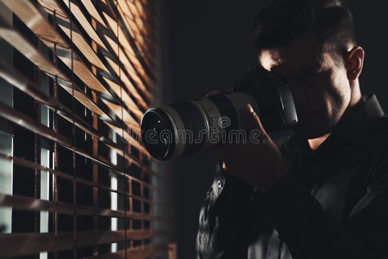 Private Detective with Camera Spying Near Window Indoors Stock Image ...
