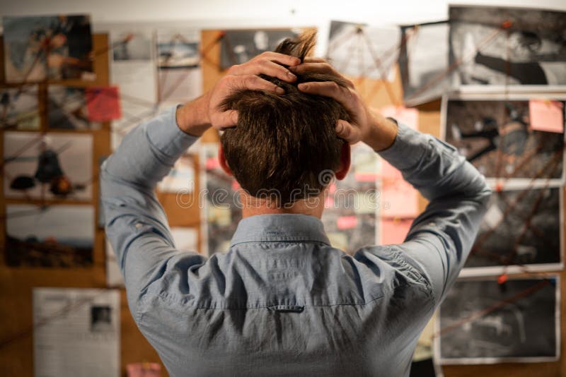 Private Detective Working in His Office Holding Head Has Problem in ...