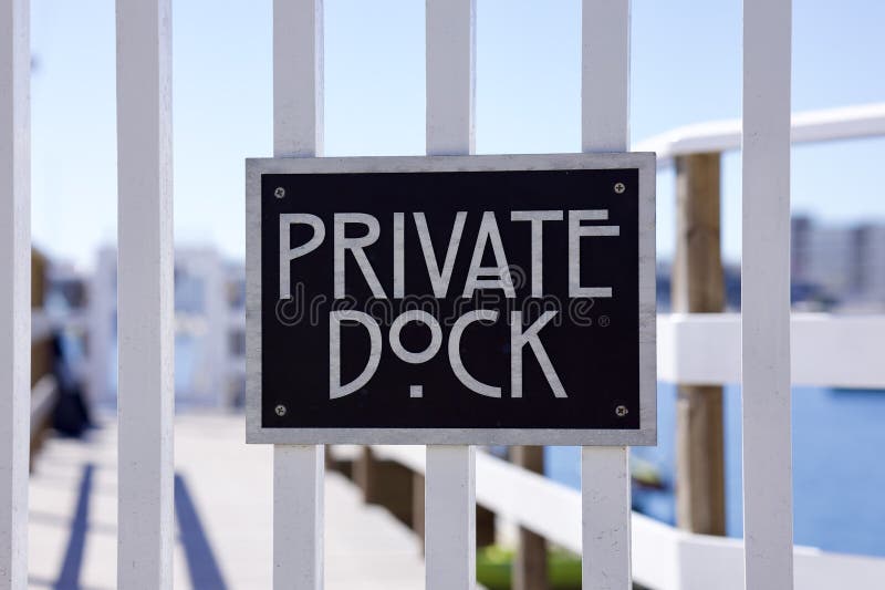 Private Dock Sign Hangs from a White Gate Stock Photo - Image of deco ...
