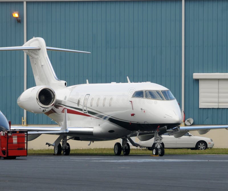Private jet in hangar stock photo. Image of aircraft - 26695624