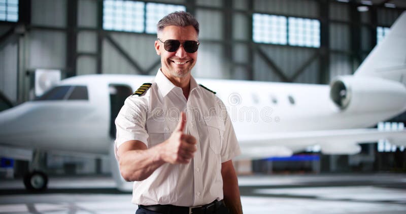 Private Jet Captain Pilot in Uniform. Small Airplane Stock Photo ...