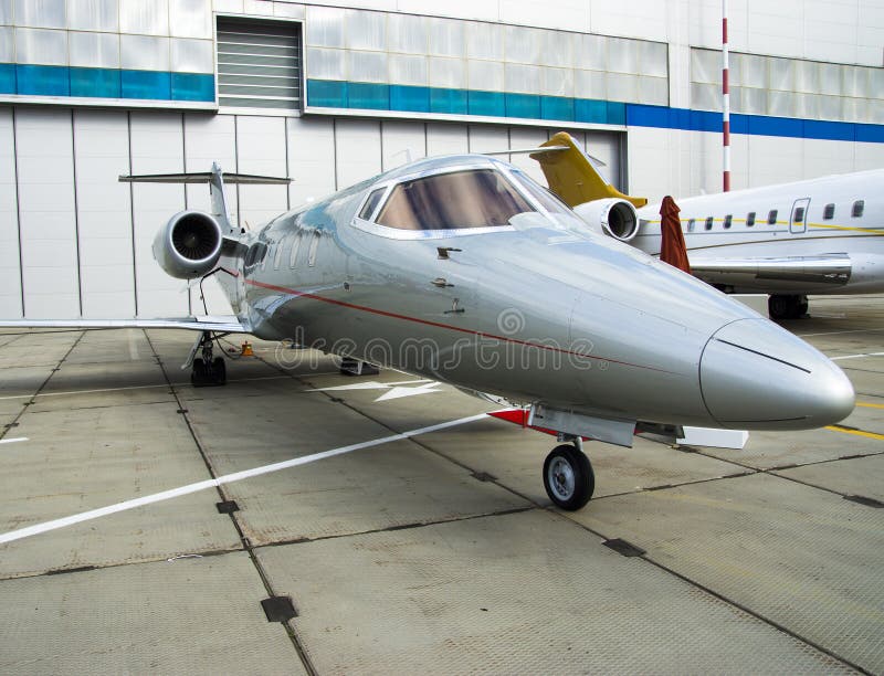 Private Jet in hangar stock photo. Image of corporate - 29559398