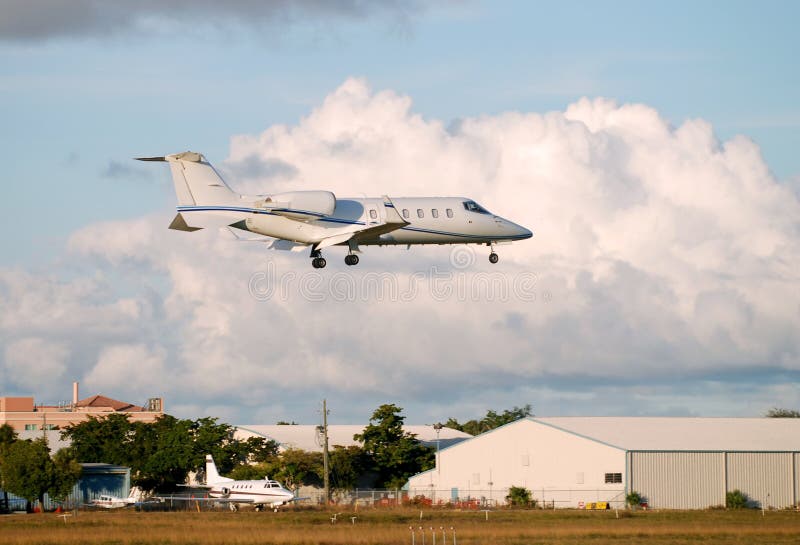 Private jet landing stock photo. Image of executive, landing - 4310650