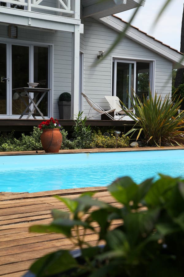 Private Swimming Pool in Front of Modern House Stock Photo - Image of ...