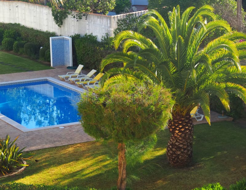 Private Swimming Pool in the Garden of a House Stock Image - Image of ...