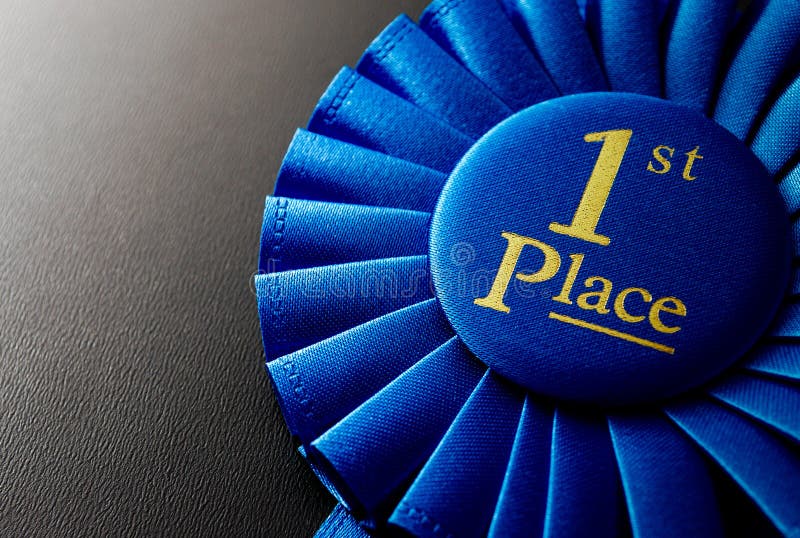 Blue First Place Winner Rosette Stock Photo - Image of prize ...