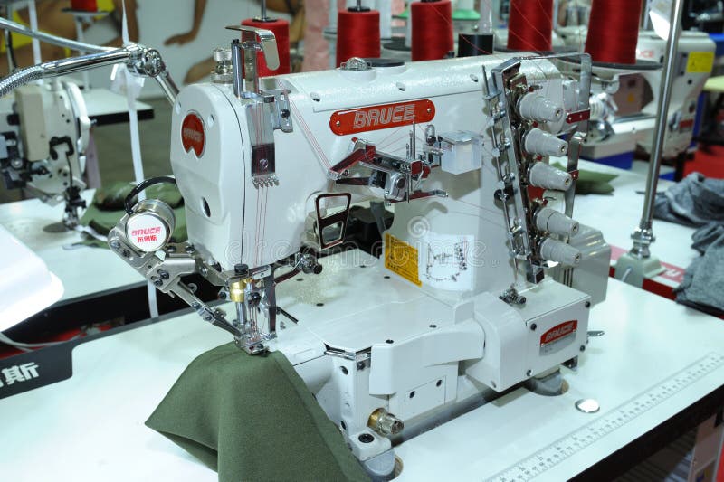 Pro Electric Sewing Machine Bruce Working on a Worktable at the ...