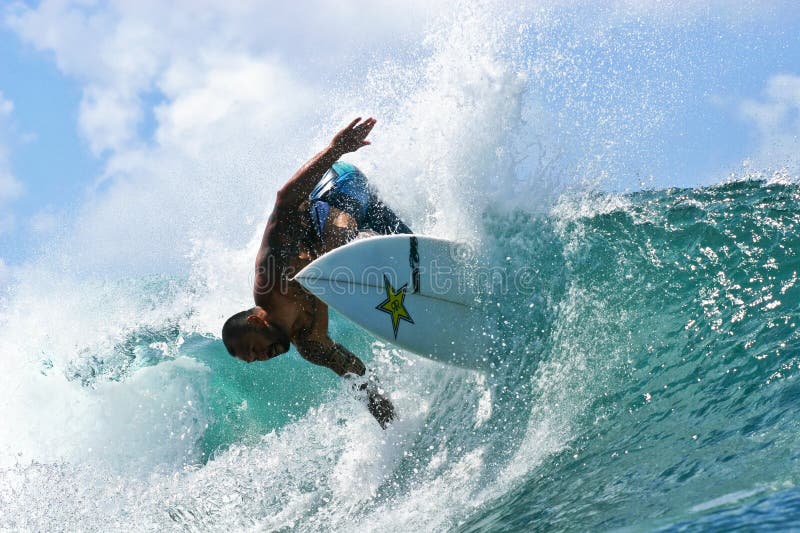 A Man Surfing a Blue Wave in Hawaii Editorial Photography - Image of ...