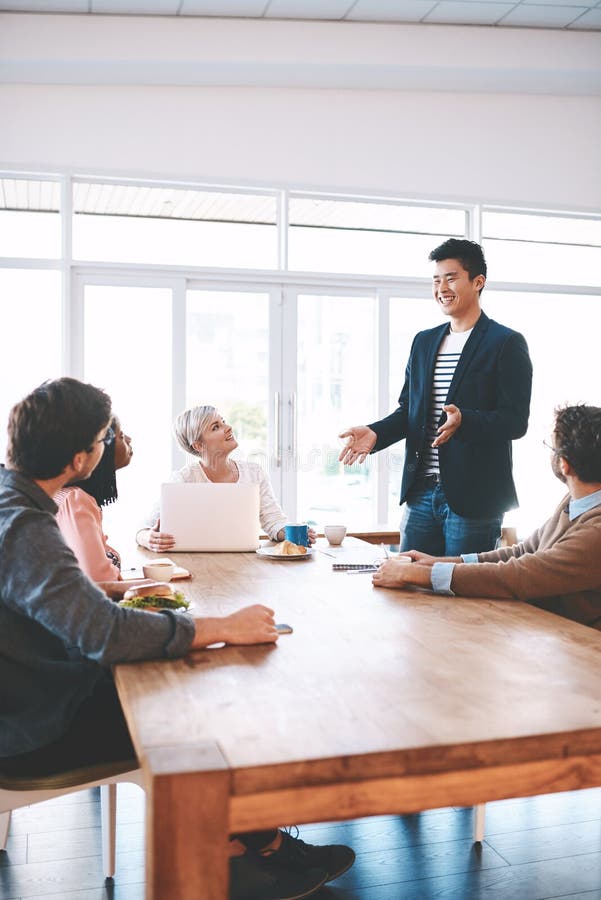 Proactive Teams are Productive Teams. a Group of Young Businesspeople ...