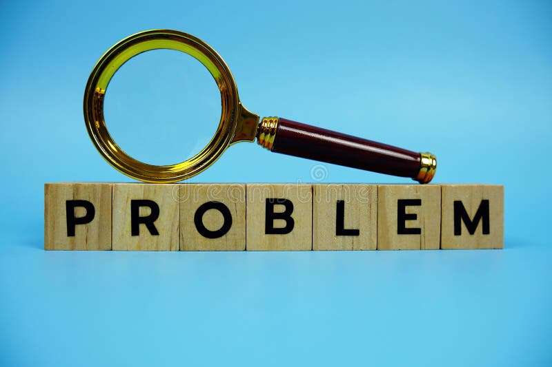 Problem with Wooden Blocks Alphabet Letters and Magnifying Glass on ...