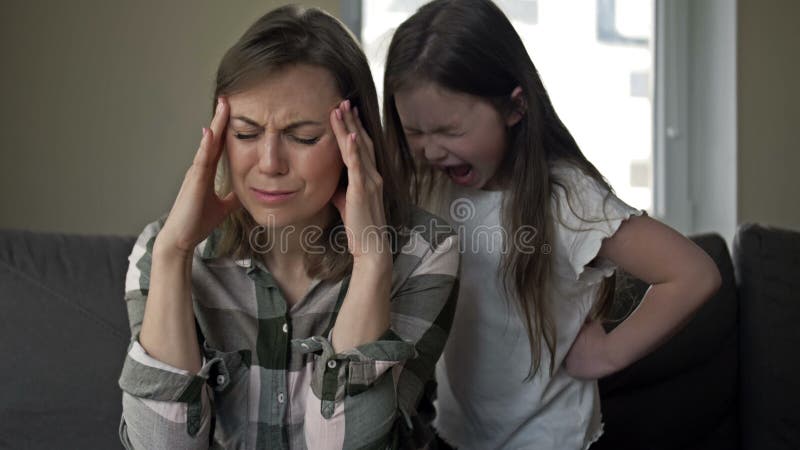 Problems of Raising Children. Woman Cannot Cope with a Capricious Child ...