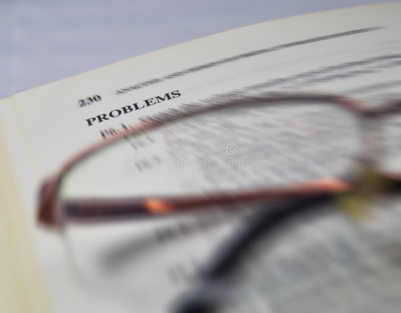Problems on a School and University Textbook with Glasses Stock Photo ...