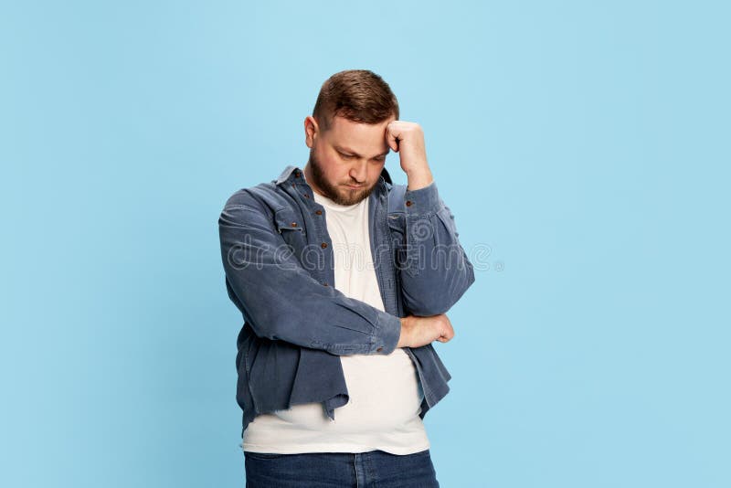 One Pensive Man Standing with Folded Hands and Thinking with Sad Facial ...