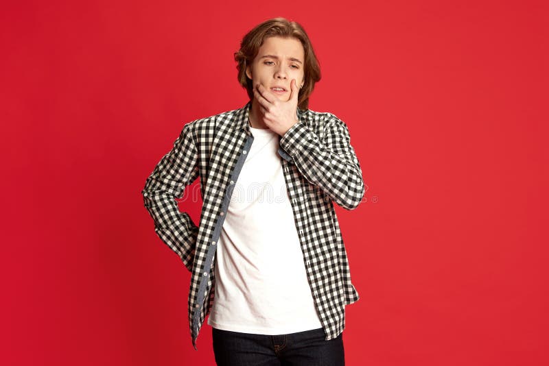 One Pensive Man Standing with Folded Hands and Thinking with Sad Facial ...