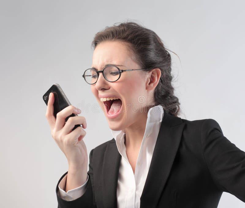 Angry Woman Shouting at Her Cell Phone, Enraged with Bad Service Stock ...