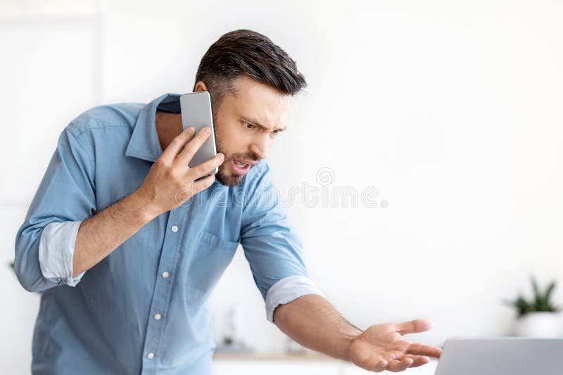 Problems at Work. Angry Businessman Talking on Cellphone, Having ...