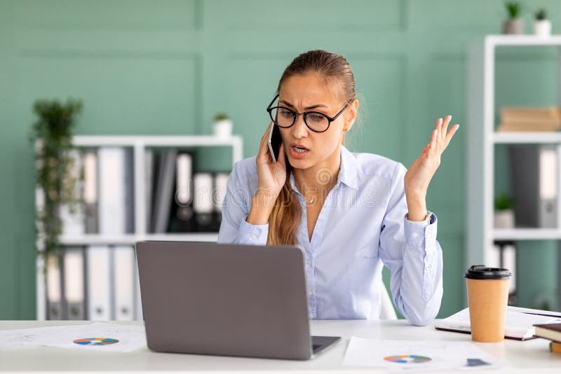 Problems at Work. Stressed Businesswoman Talking on Smartphone and ...