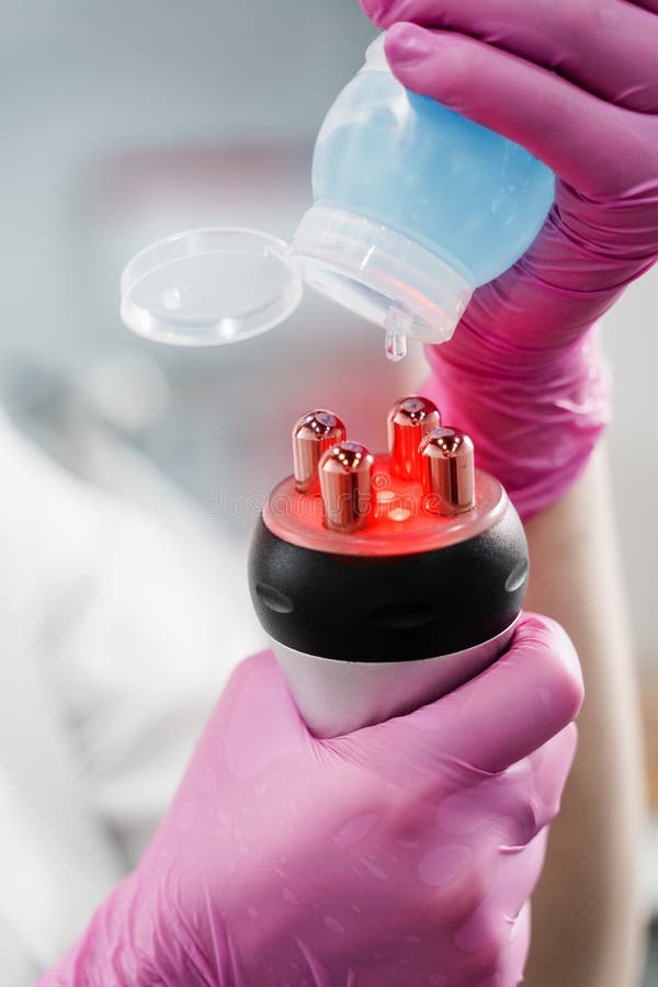 Process of Applying Contact Gel To the RF Lifting Head with Red Light ...