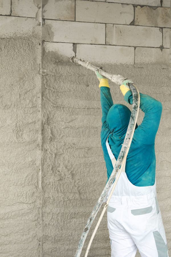 The Process of Applying Plaster To Walls Inside a Building by Machine ...