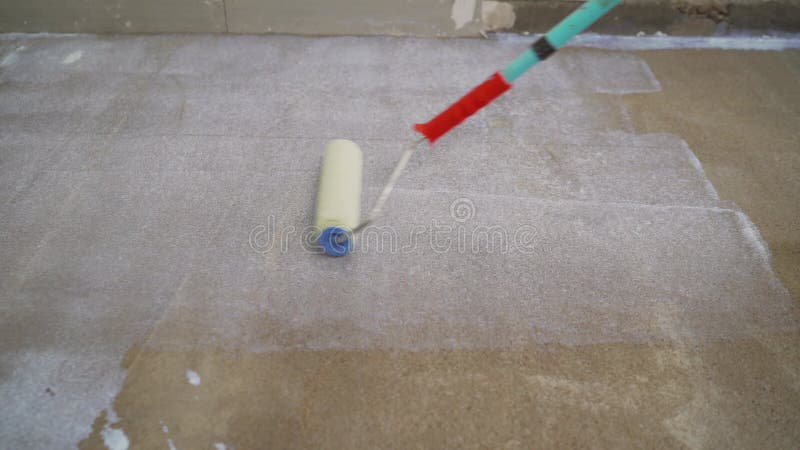 The Process of Priming a Plastered Surface. Concrete Floor Primer To ...