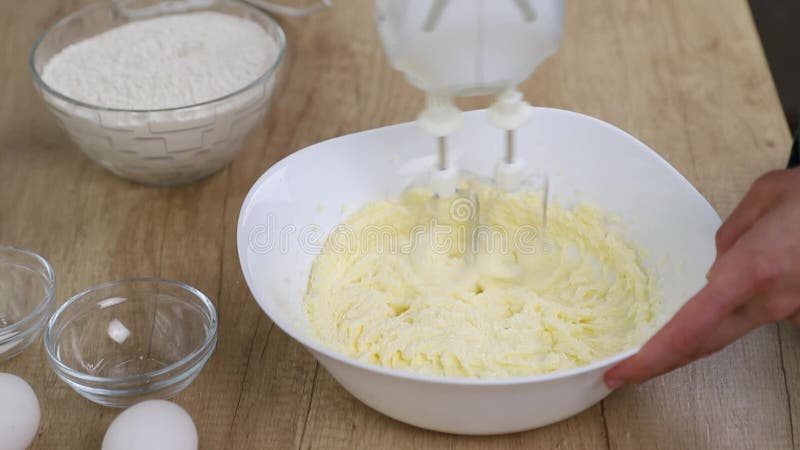 Beating Butter with Sugar with a Mixer with Whisk, the Process of ...