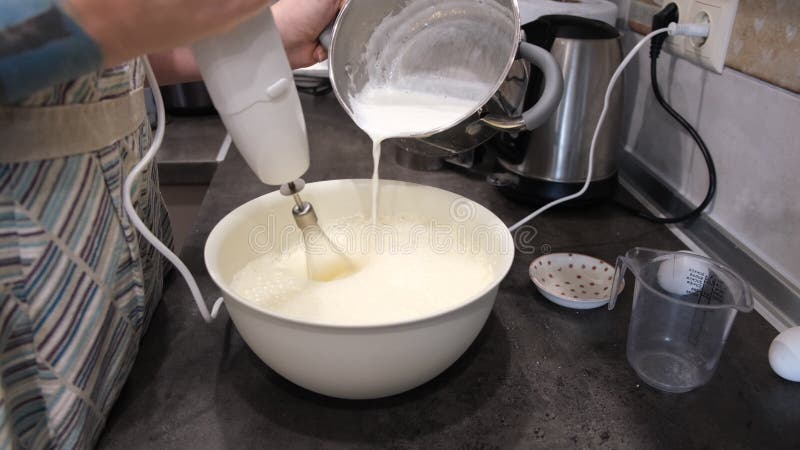 The Process of Beating Eggs with Sugar and Flour with Stock Footage ...