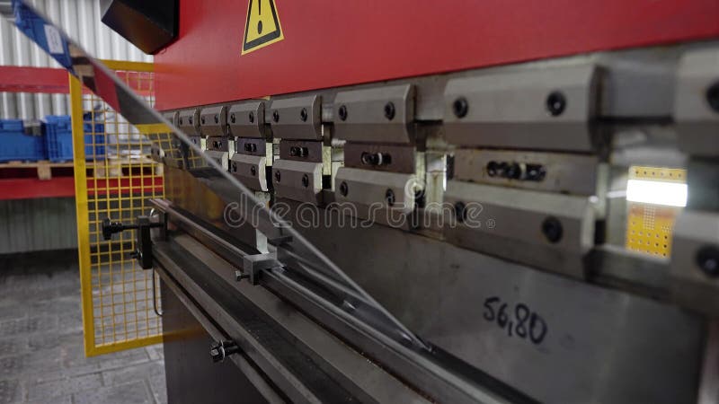 The Process of the Bending Machine. Working Metal Bends. Close-up in ...