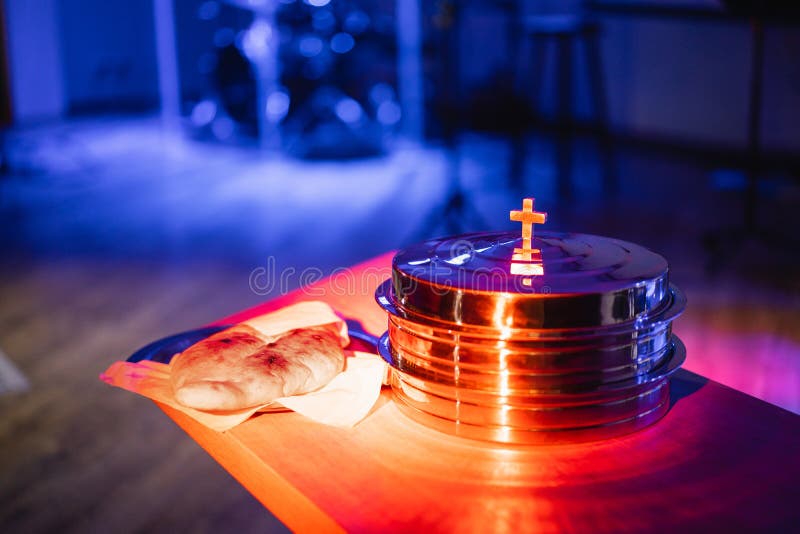 The Process of Breaking Bread in the Modern Church. Stock Photo - Image ...