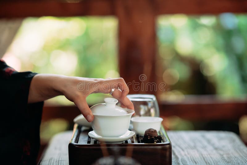 Process Brewing Tea. Woman Steeping Herbal Tea Stock Photo - Image of ...