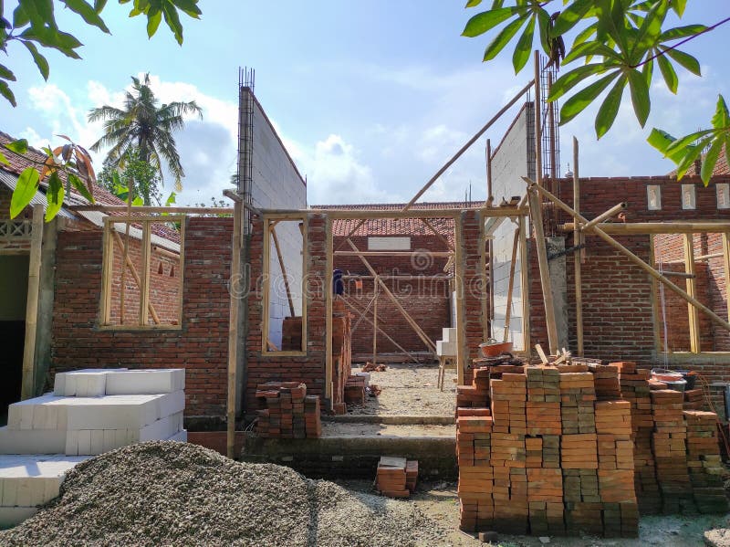 The Process of Building a House with Red Brick Stock Image - Image of ...