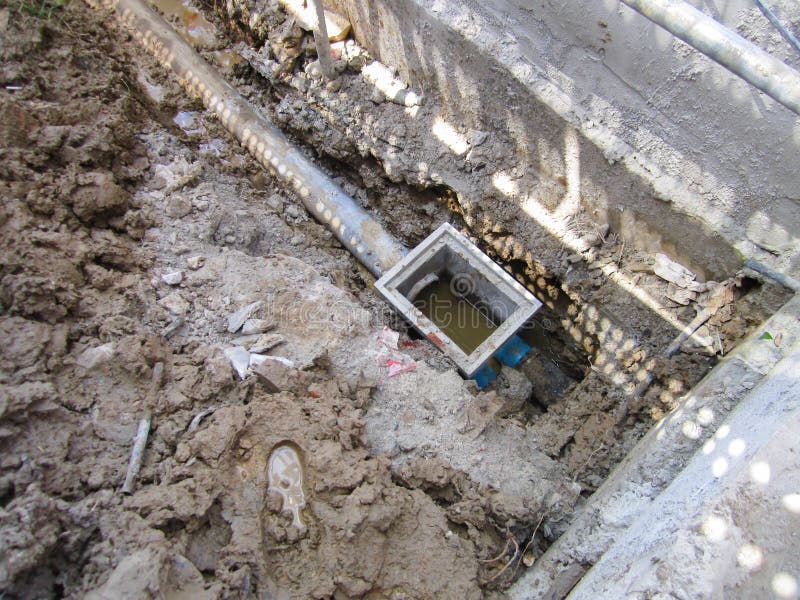 The Process Burying Drainage Pipe Around the Building. Stock Image ...