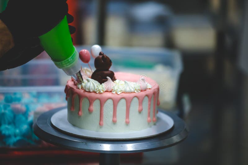 Process of Cake Baking with the Chef Decorating the Frosted Cake with ...