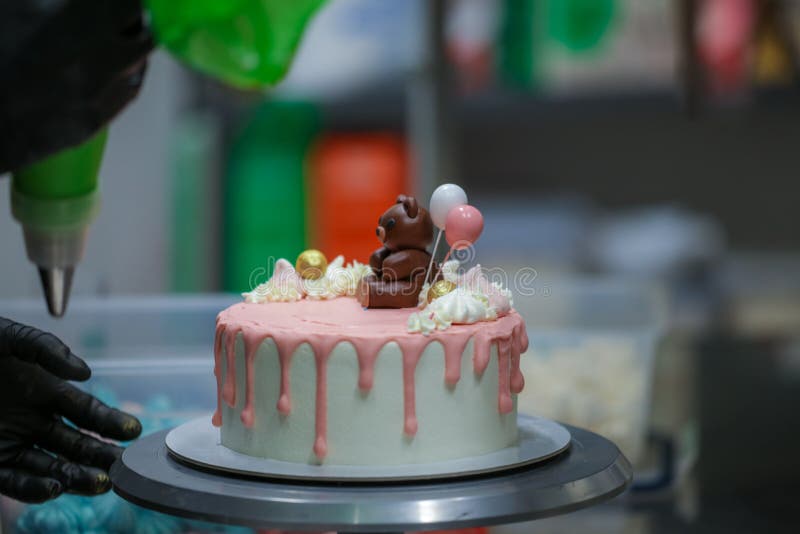 Process of Cake Baking with the Chef Decorating the Frosted Cake with ...