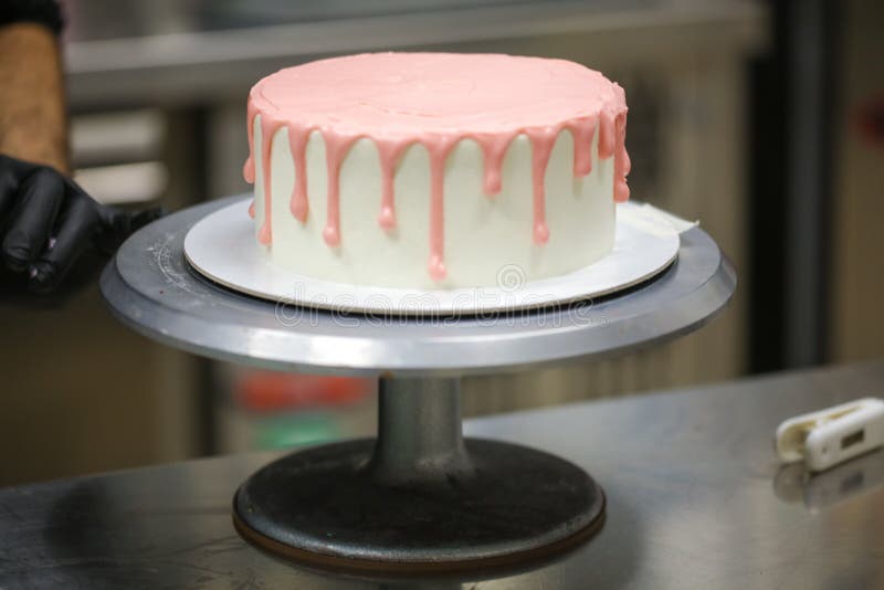 Process of Cake Baking with Chef Working on the Decorations of the ...