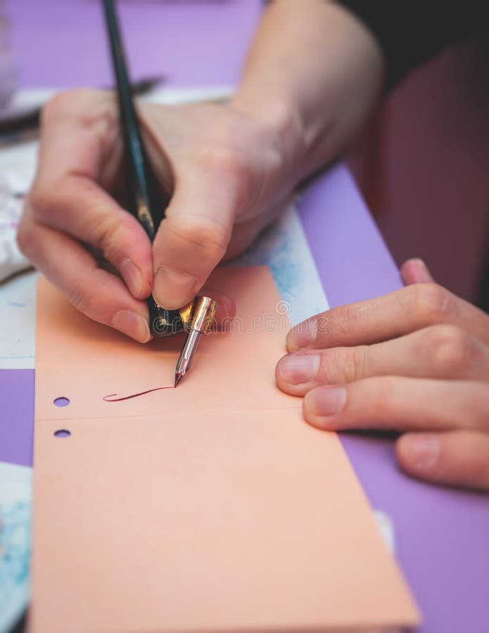 Process of Calligraphy Handwriting with an Ink Fountain Pen Feather ...